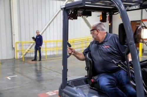 Sit-Down Forklifts vs. Stand-Up Forklifts: Which Is Better? - Conger ...